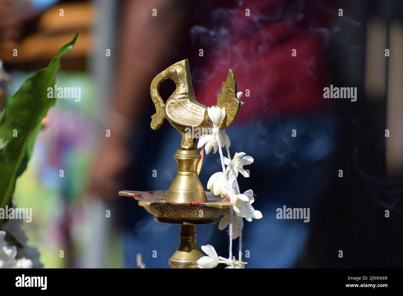 Brass coconut oil lamp Stock Photo - Alamy