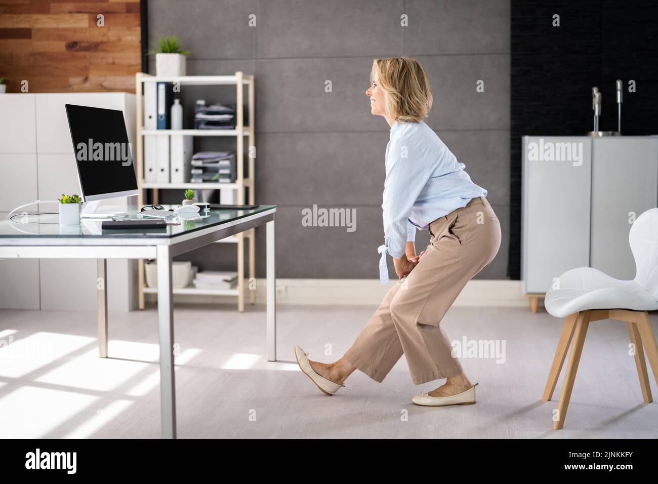 Stretching Office Workout. Desk Stretch Exercise At Workplace Stock ...