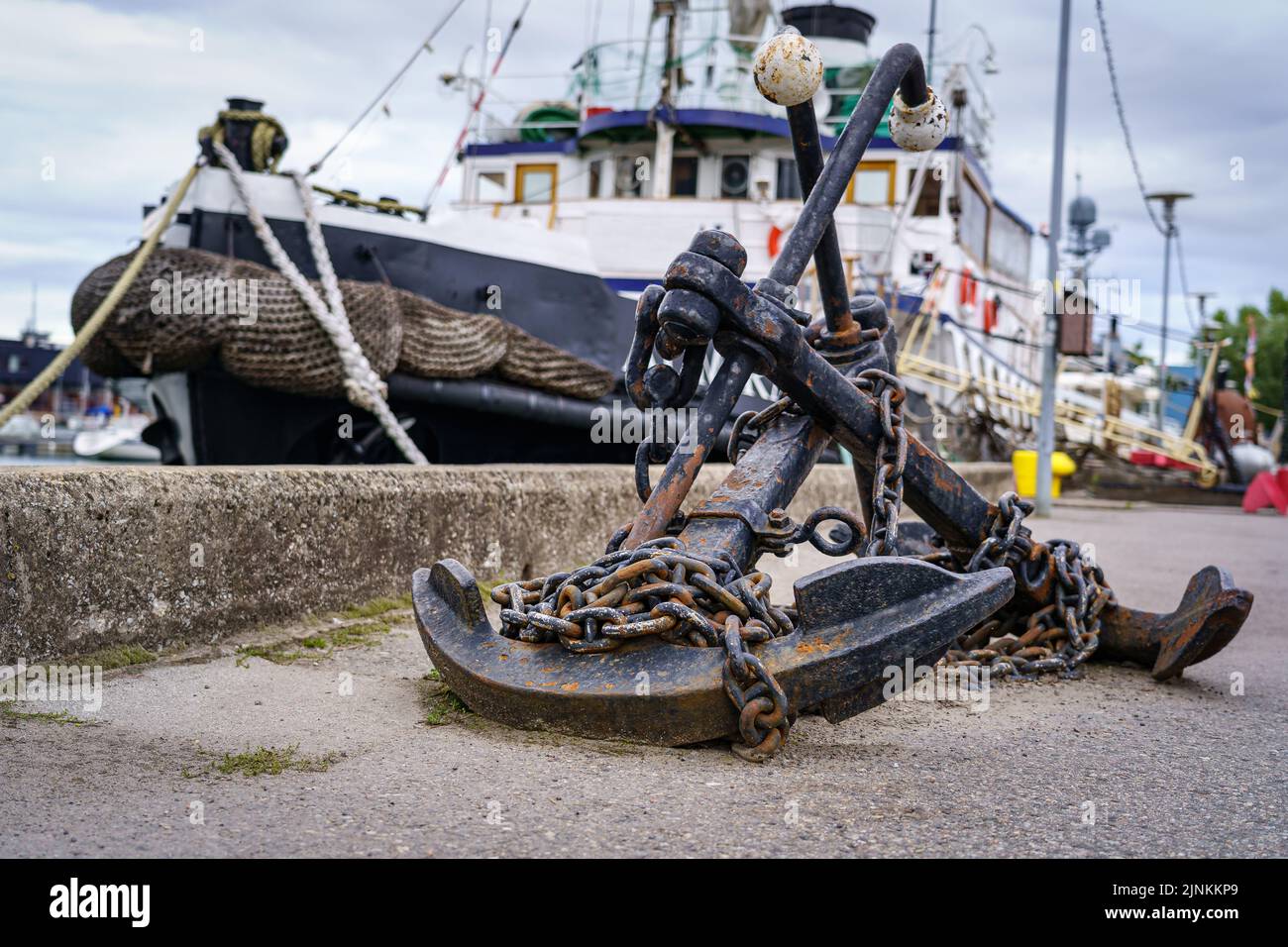 Large anchors with chains deposited in the port. Tallinn Estonia Stock ...