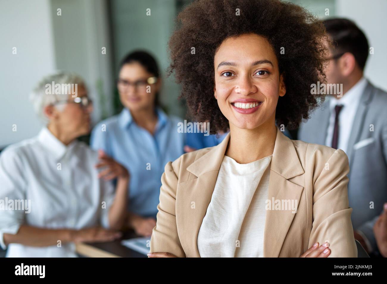 Portrait of a successful black business woman smiling in corporate ...