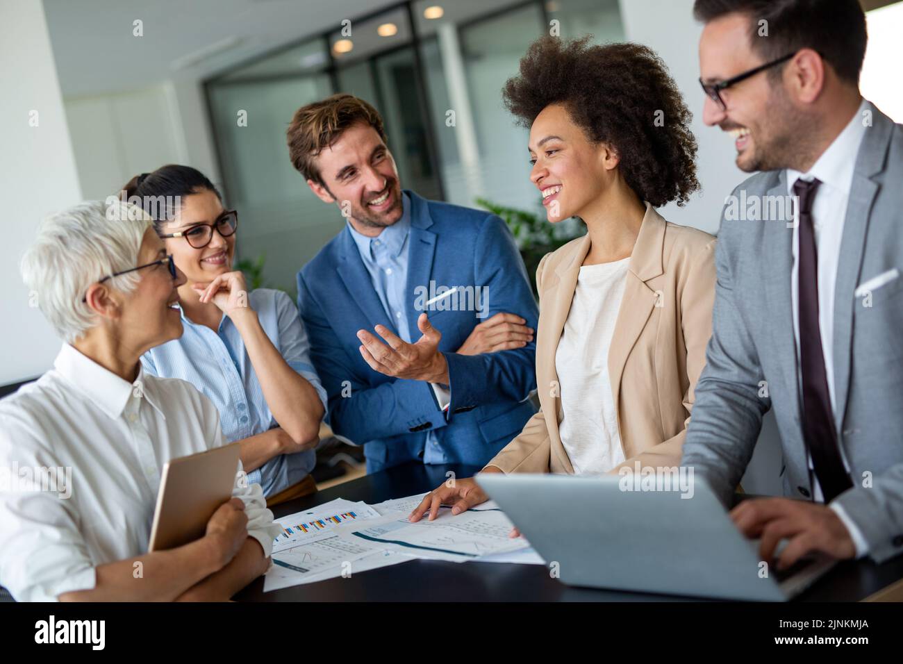 Happy group of business team celebrating a good job in the office ...