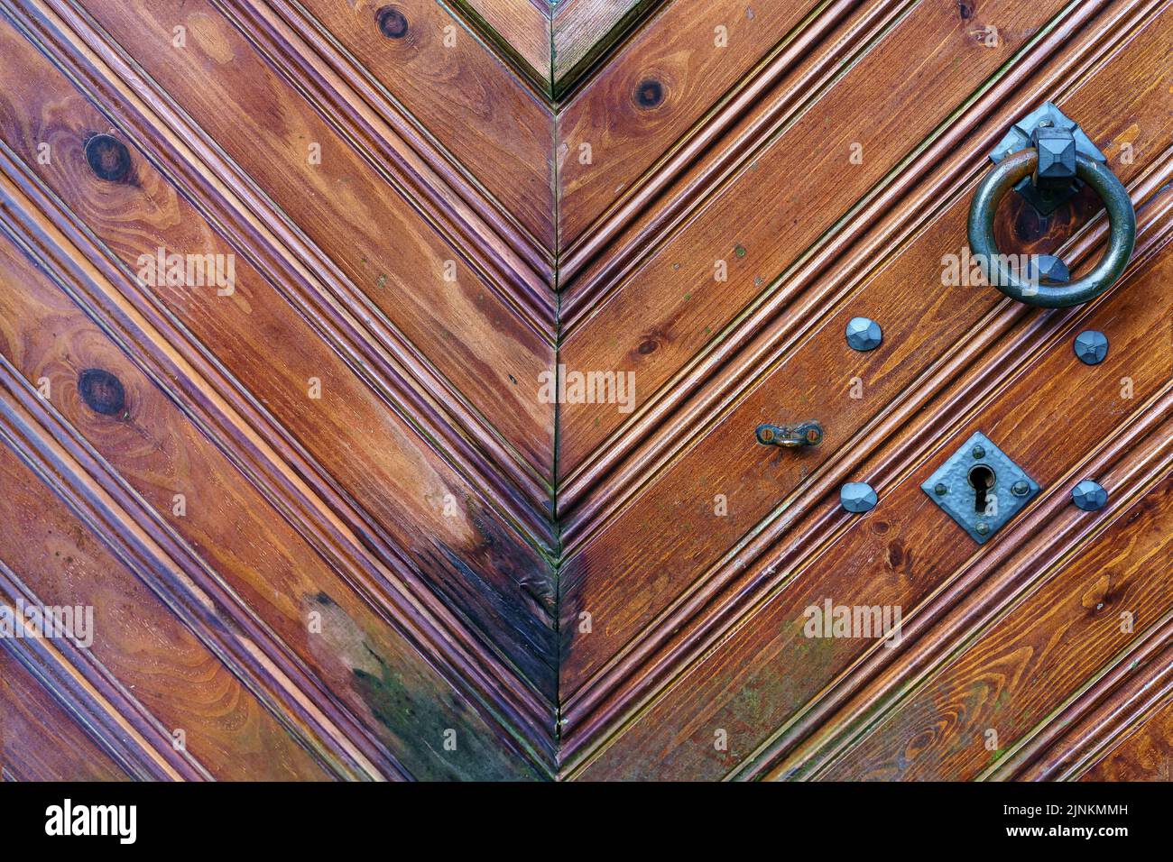 Medieval wooden door with diagonal planks and lock Stock Photo - Alamy