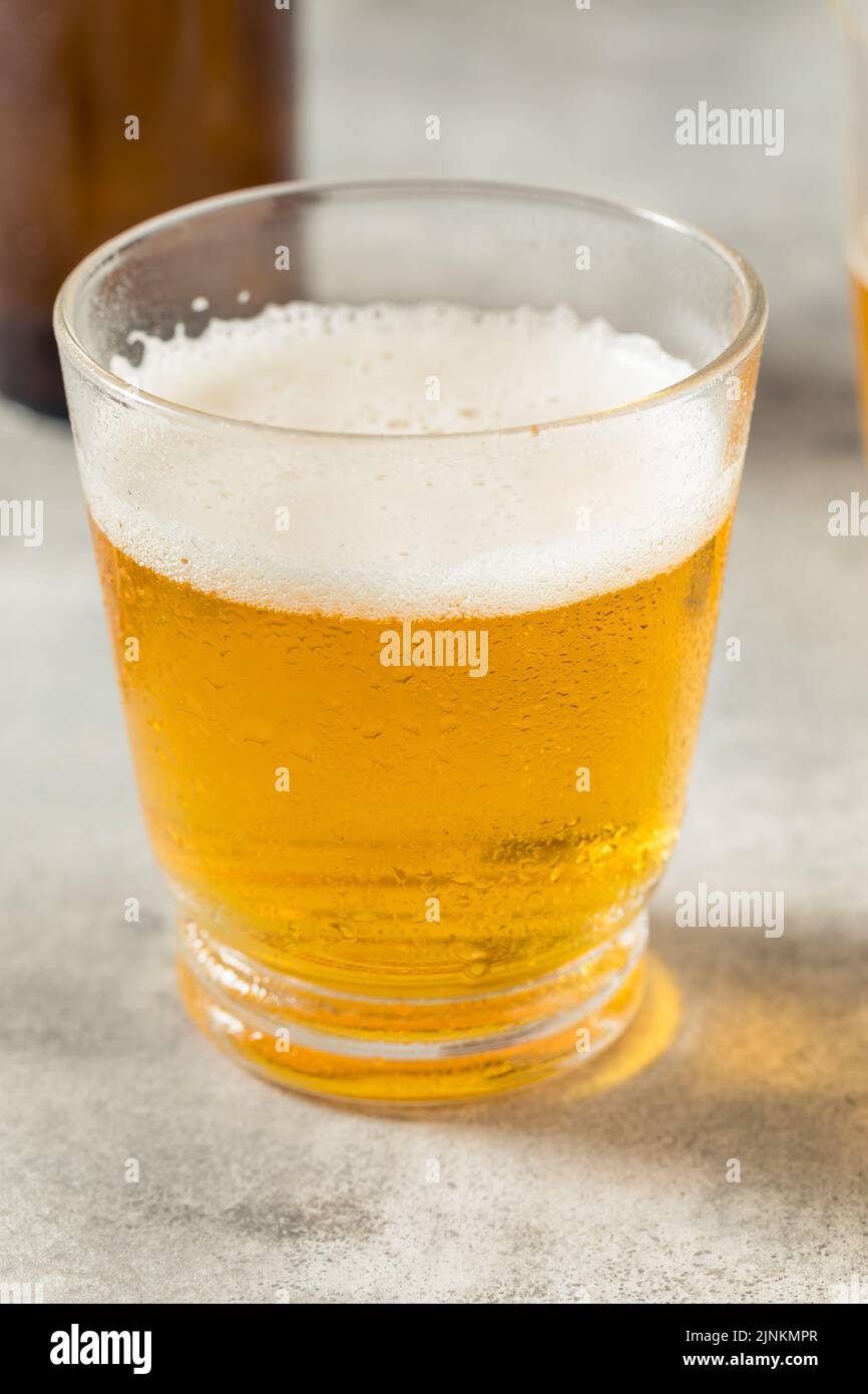 Cold Boozy Refreshing Beer in a Short Glass Stock Photo - Alamy