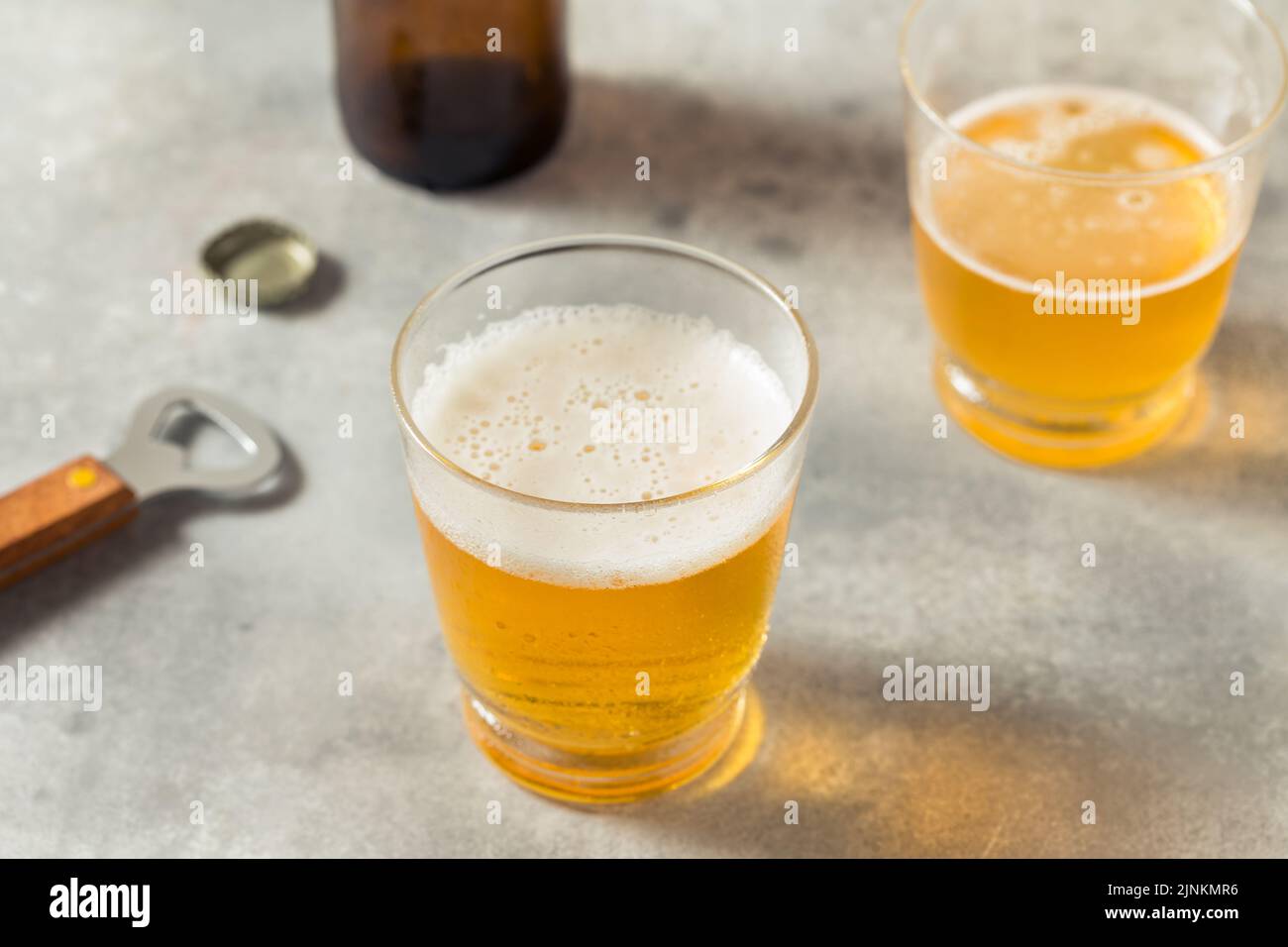 Cold Boozy Refreshing Beer in a Short Glass Stock Photo - Alamy