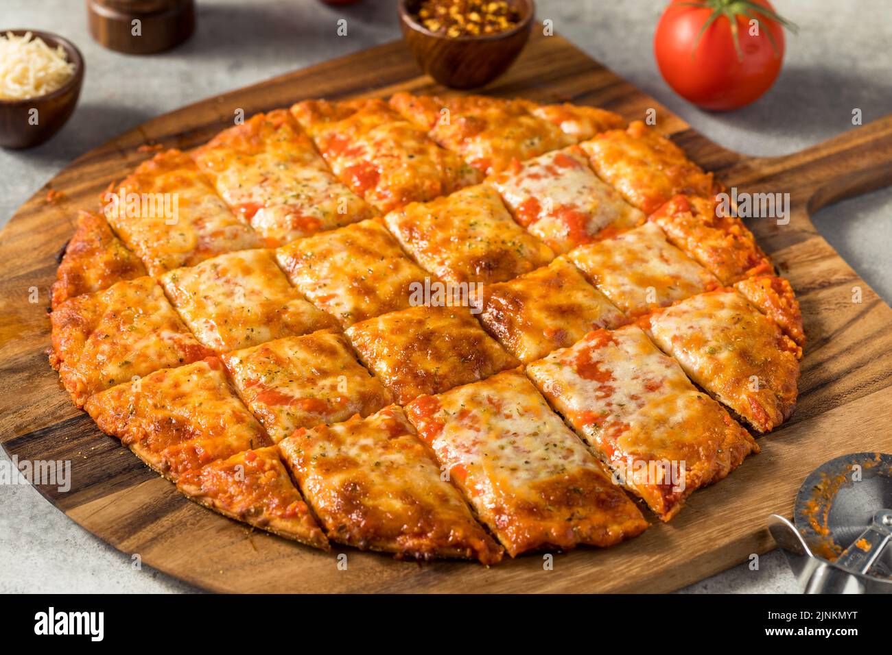 Homemade Tavern Style Cut Cheese PIzza Ready to Eat Stock Photo - Alamy