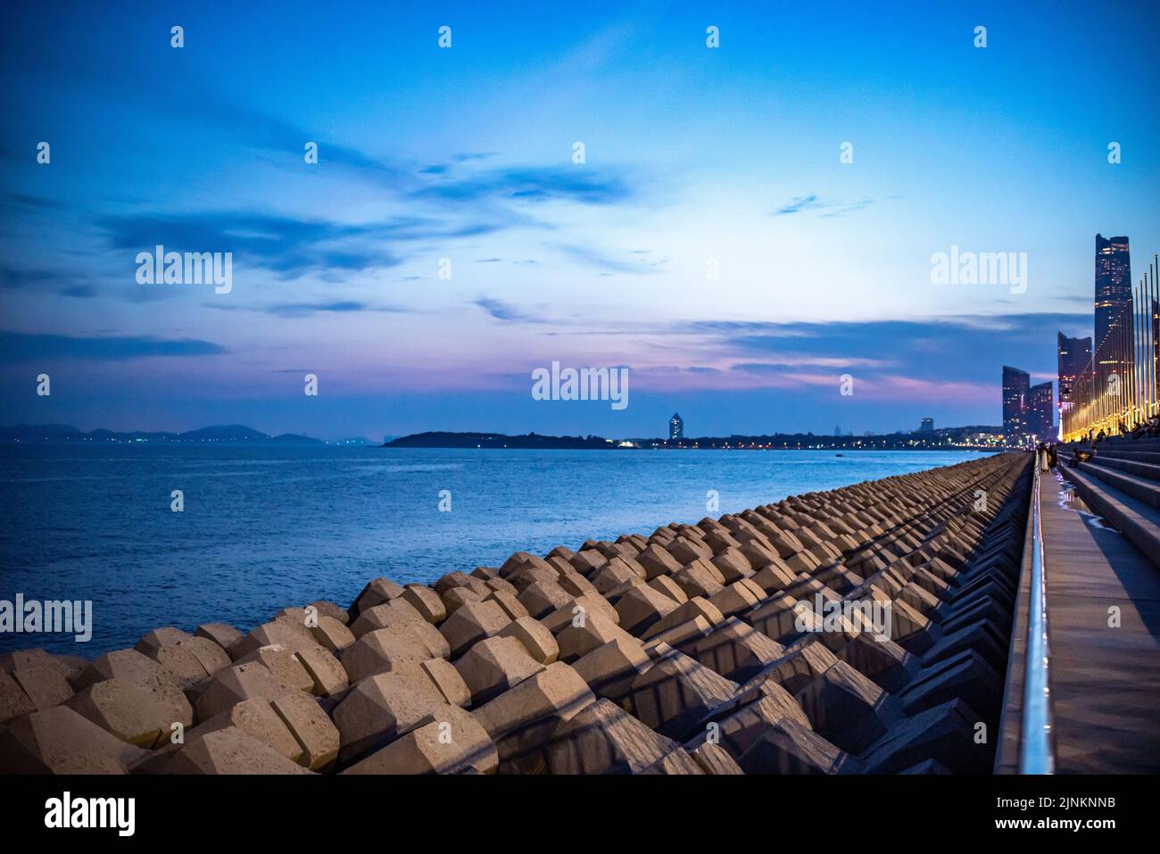 Breakwater,wave barrier,neatly arranged on the shoreline Stock Photo ...