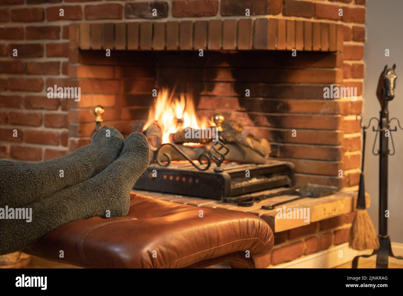 Female feet fireplace hi-res stock photography and images - Alamy