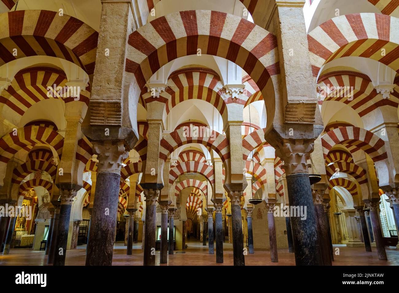 Perspective of the striped arches of the Cordoba Mosque in Spain Stock ...