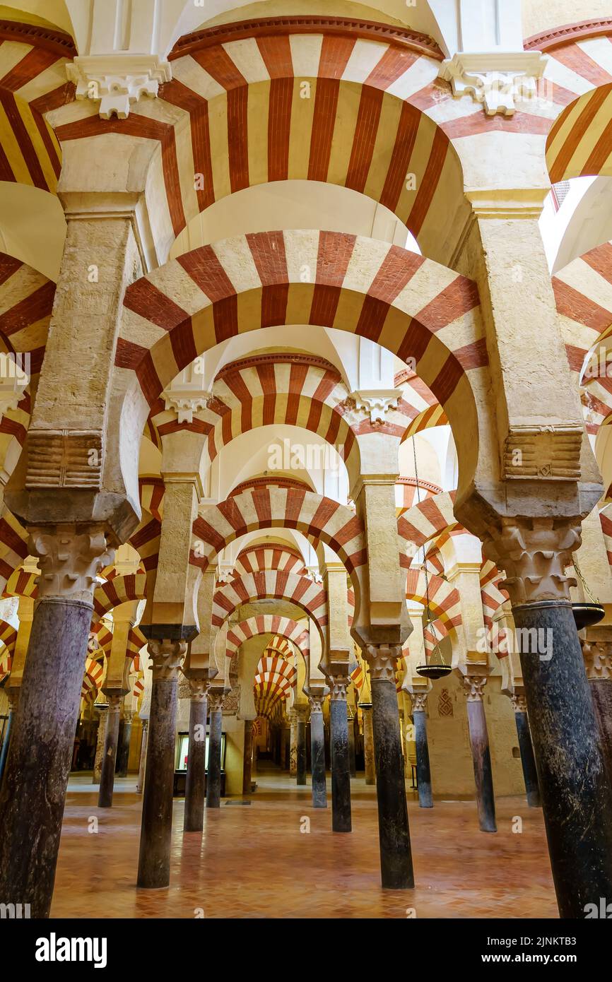Perspective of the striped arches on marble columns of the mosque of ...