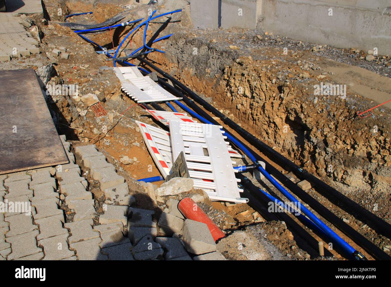 Material to secure a construction site fell into the excavation after a ...