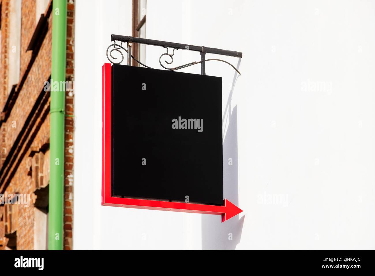modern square black signboard with red arrow white background, mock-up ...