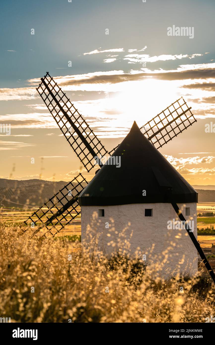 Old windmill photographed at golden hour. Sun in front of the camera ...