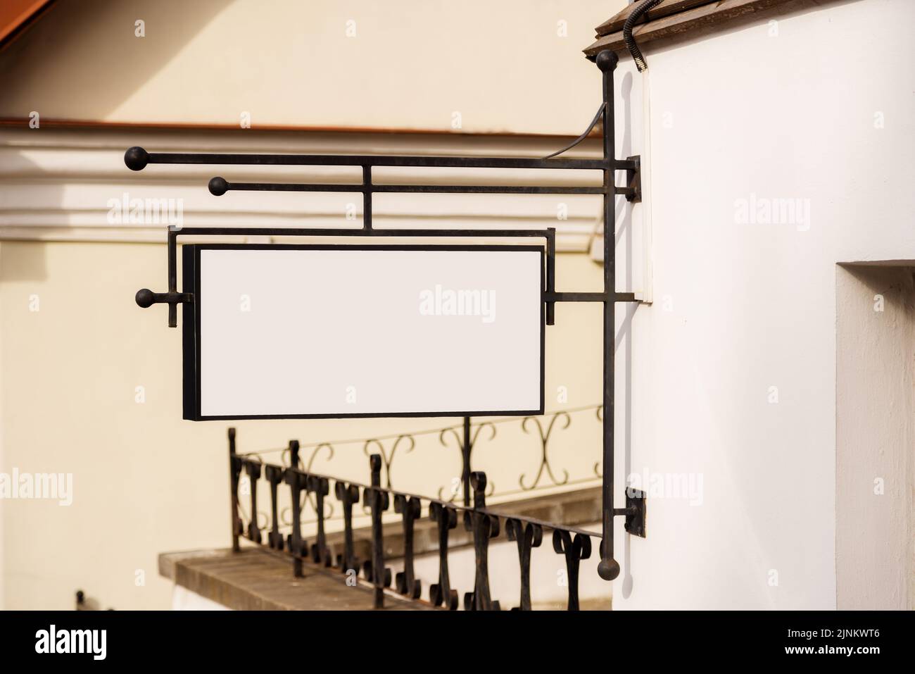 Retro style rectangular signboard mockup in the city. Place for logo ...