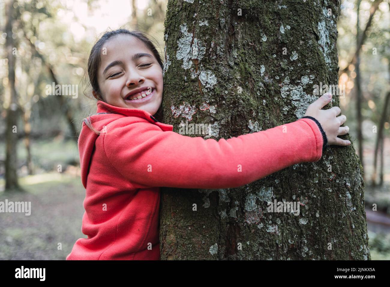 girl, embracing, tree, girls, cuddling, hug, hugging, trees Stock Photo - Alamy