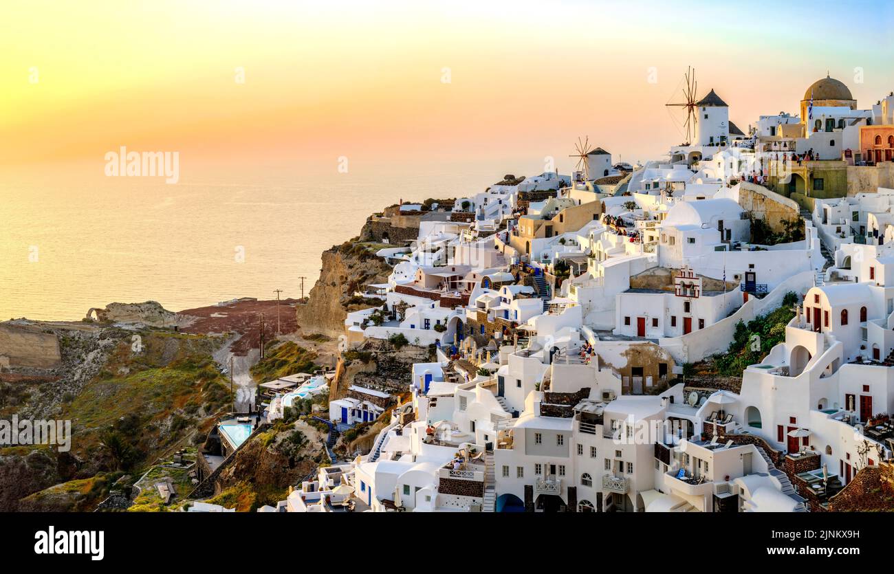 Sunset behind Windmills and classic Greek Architecture,Caldera View ...