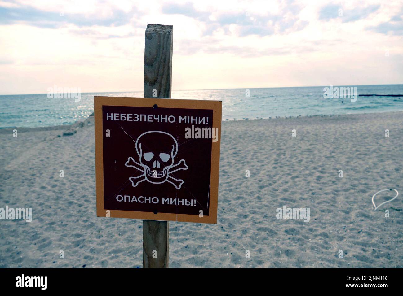 ODESA, UKRAINE - AUGUST 11, 2022 - The 'Danger Mines!' sign is pictured ...