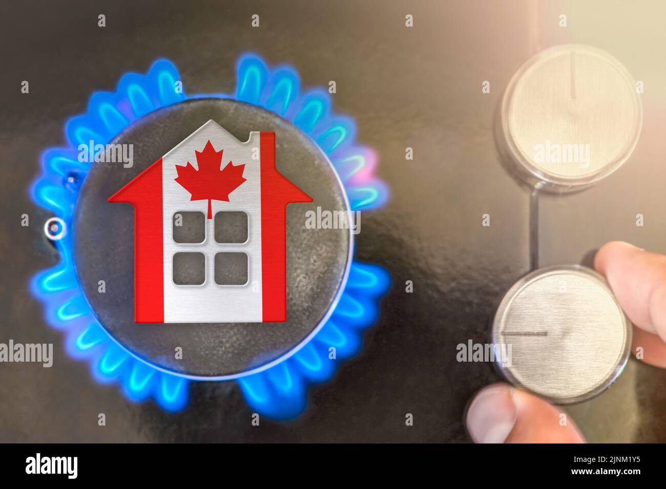 Heating season or gas use in Canada. Concept, model of a house stands ...