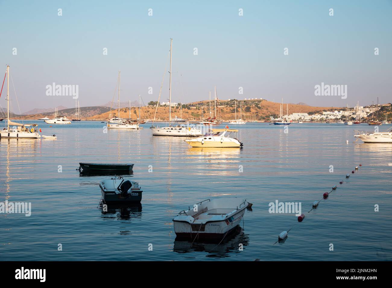 Marine landscape with yachts in a Bodrum harbor. Seaside view with ...