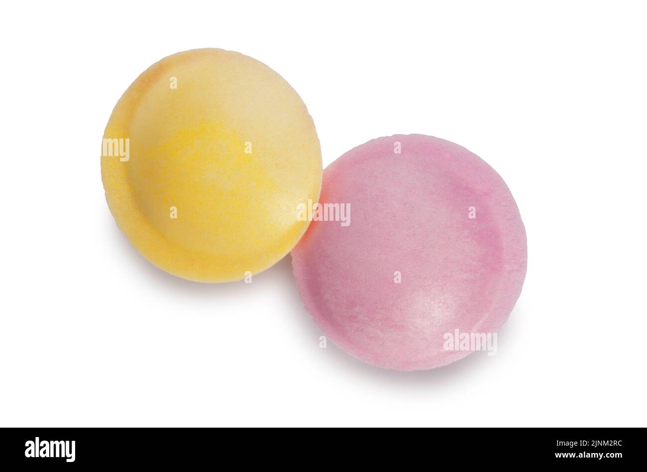 Studio shot of sherbet flying saucer sweets cut out against a white ...