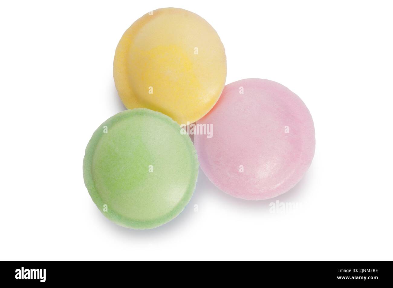 Studio shot of sherbet flying saucer sweets cut out against a white ...