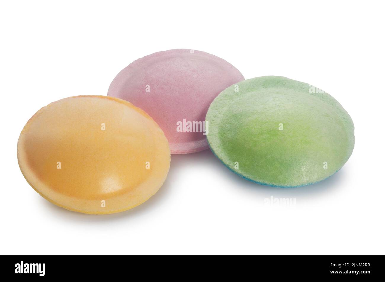 Studio shot of sherbet flying saucer sweets cut out against a white ...