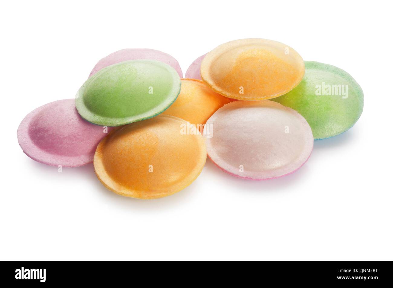 Studio shot of sherbet flying saucer sweets cut out against a white ...