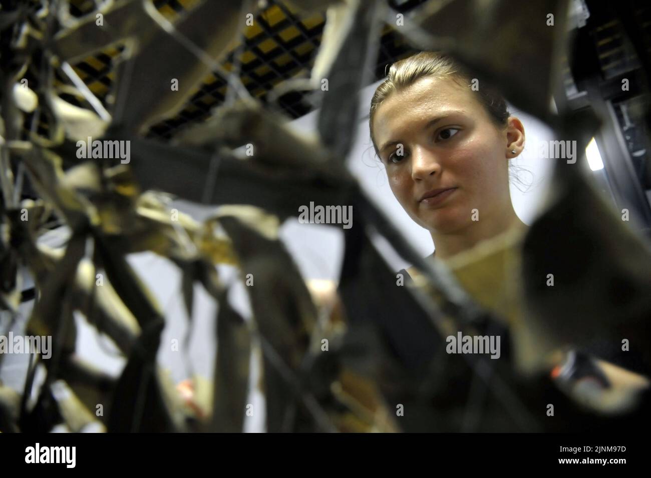 Vinnytsia Ukraine August 12 2022 A Woman Weaves A Camouflage Net