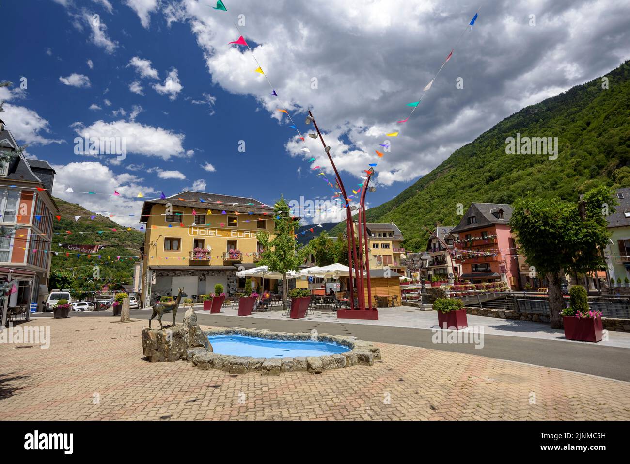 Les town hall square on a summer afternoon, in the Aran Valley (Lleida ...
