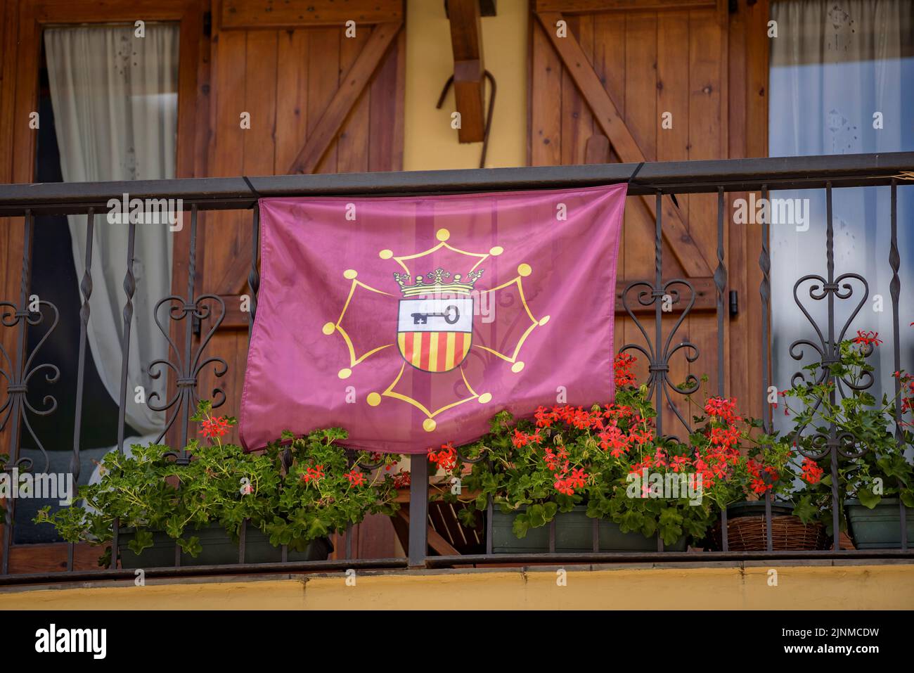 Flag of the Aran Valley, inspired by the Occitan flag, hanging from a ...