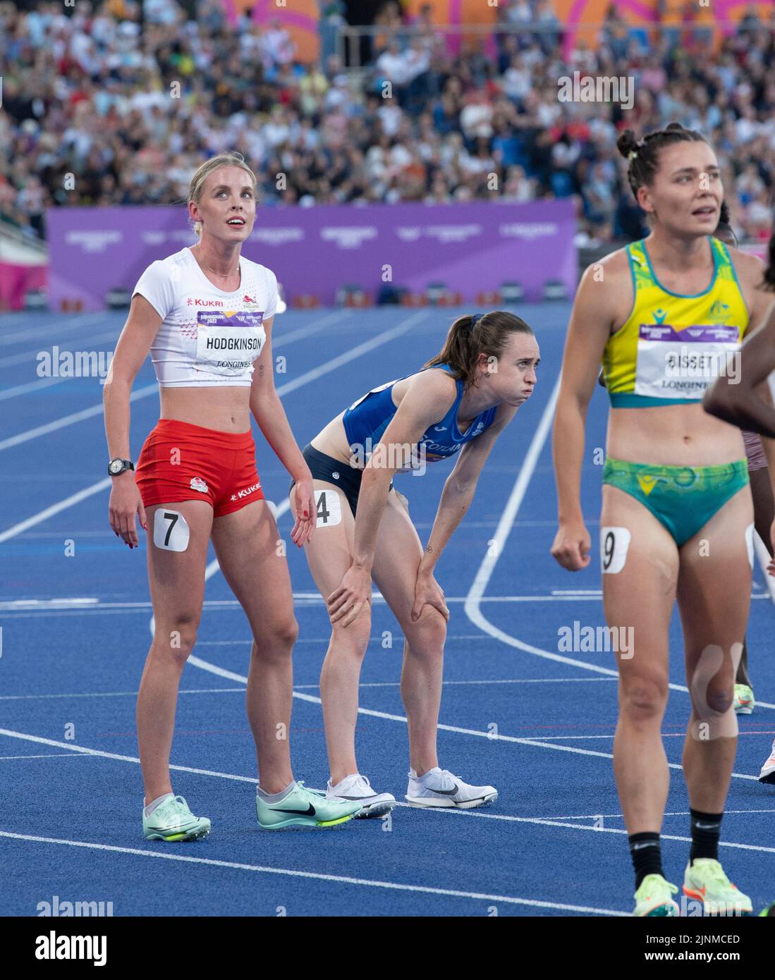 Keely Hodgkinson of England and Laura Muir of Scotland recovering after ...