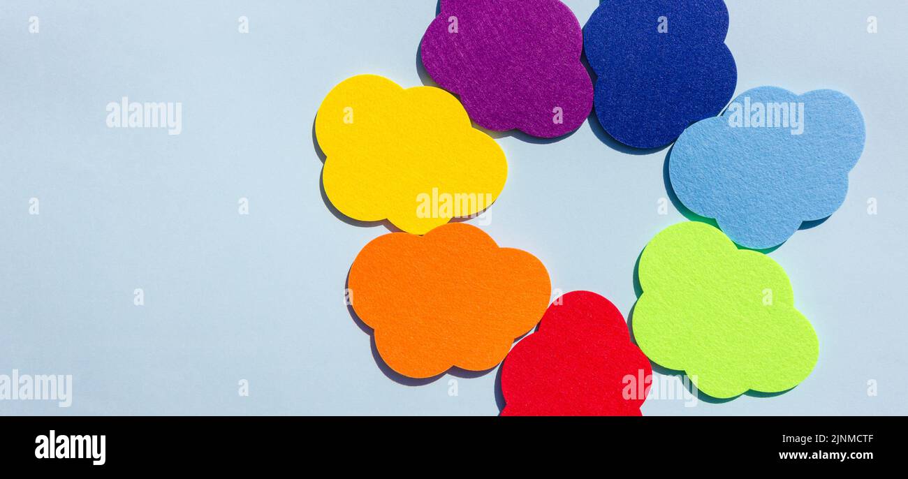 Banner. Rainbow color clouds and lettering Back To School on the blue ...