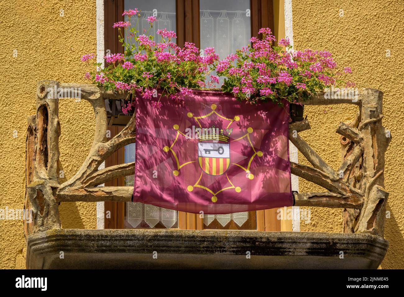 Flag of the Aran Valley, inspired by the Occitan flag, hanging from a ...