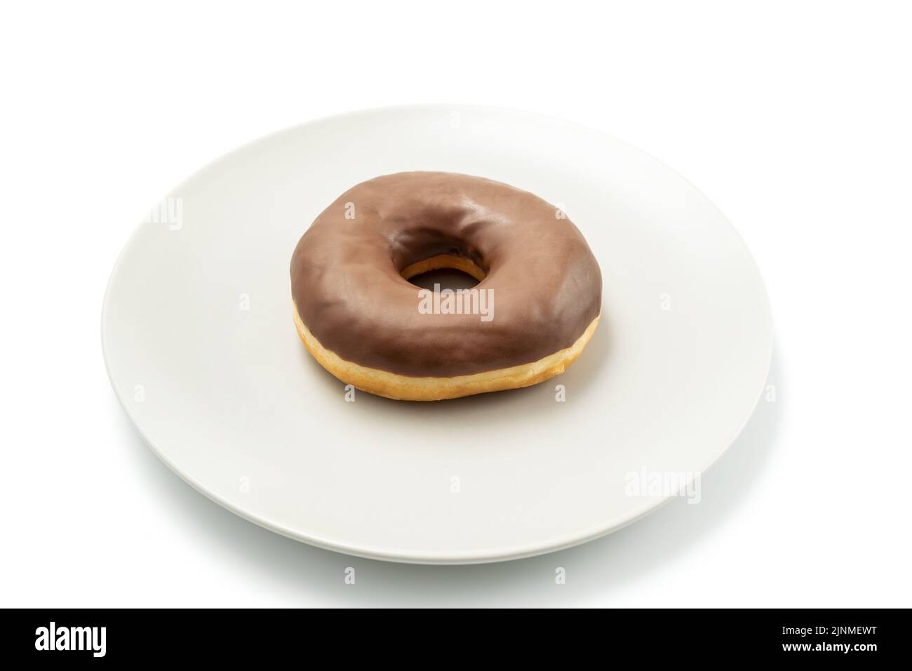 Tasty Donut dessert with chocolate glossy glaze in a plate, isolated on ...