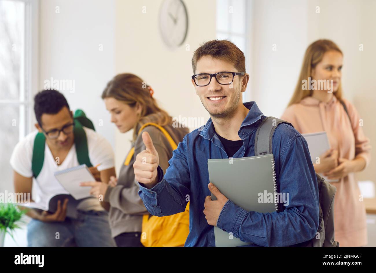 Happy college or university student who has achieved success in studies ...