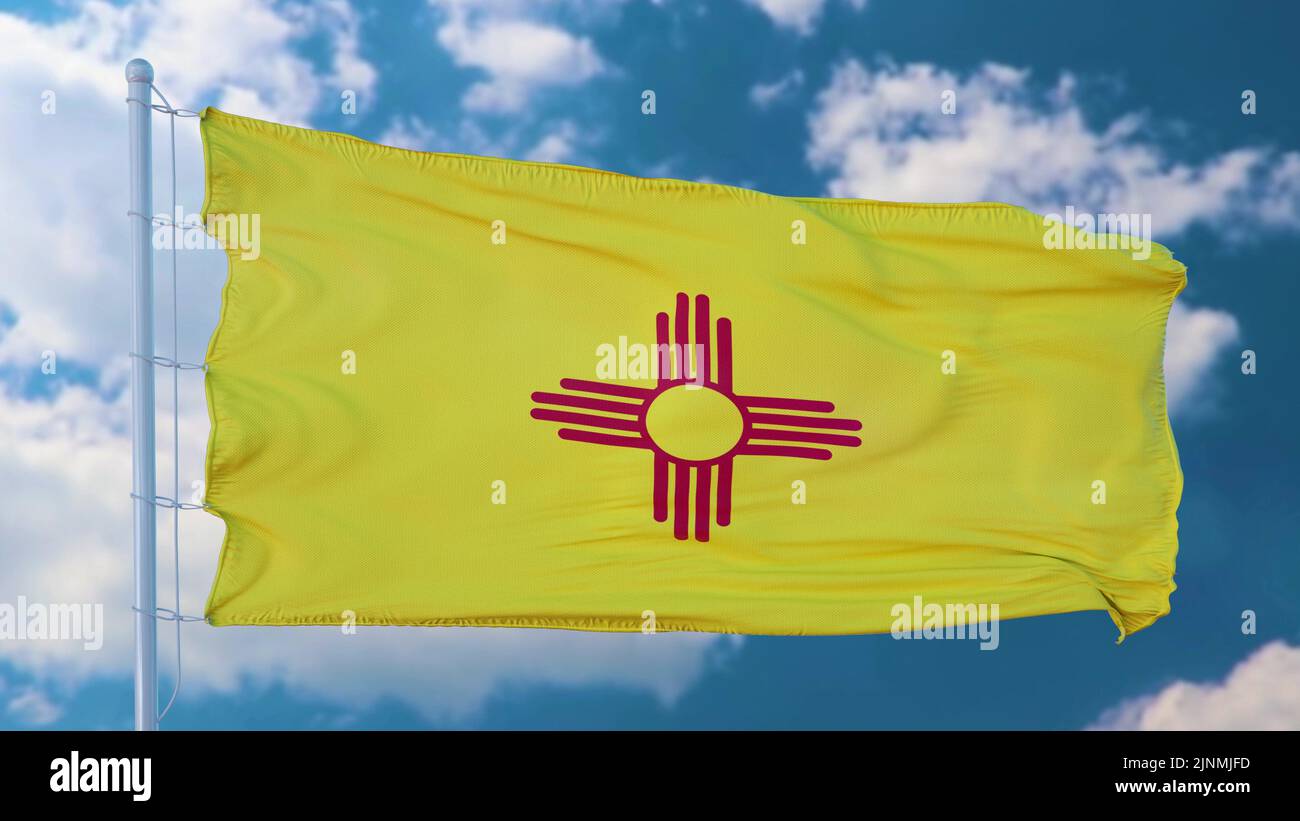 New Mexico flag on a flagpole waving in the wind, blue sky background ...