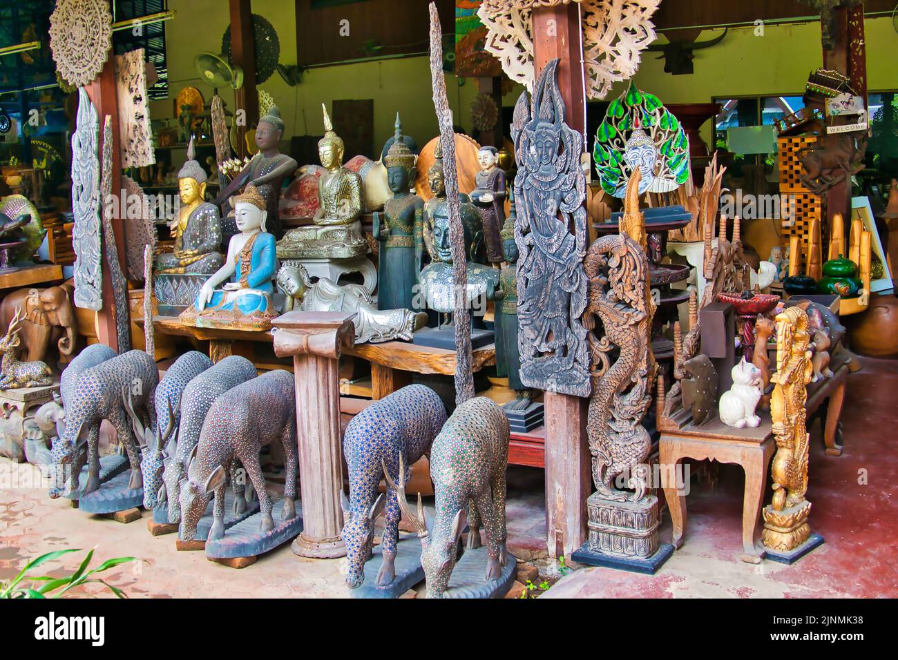 Store with buddhist religious sculptures in the artists village of Baan ...