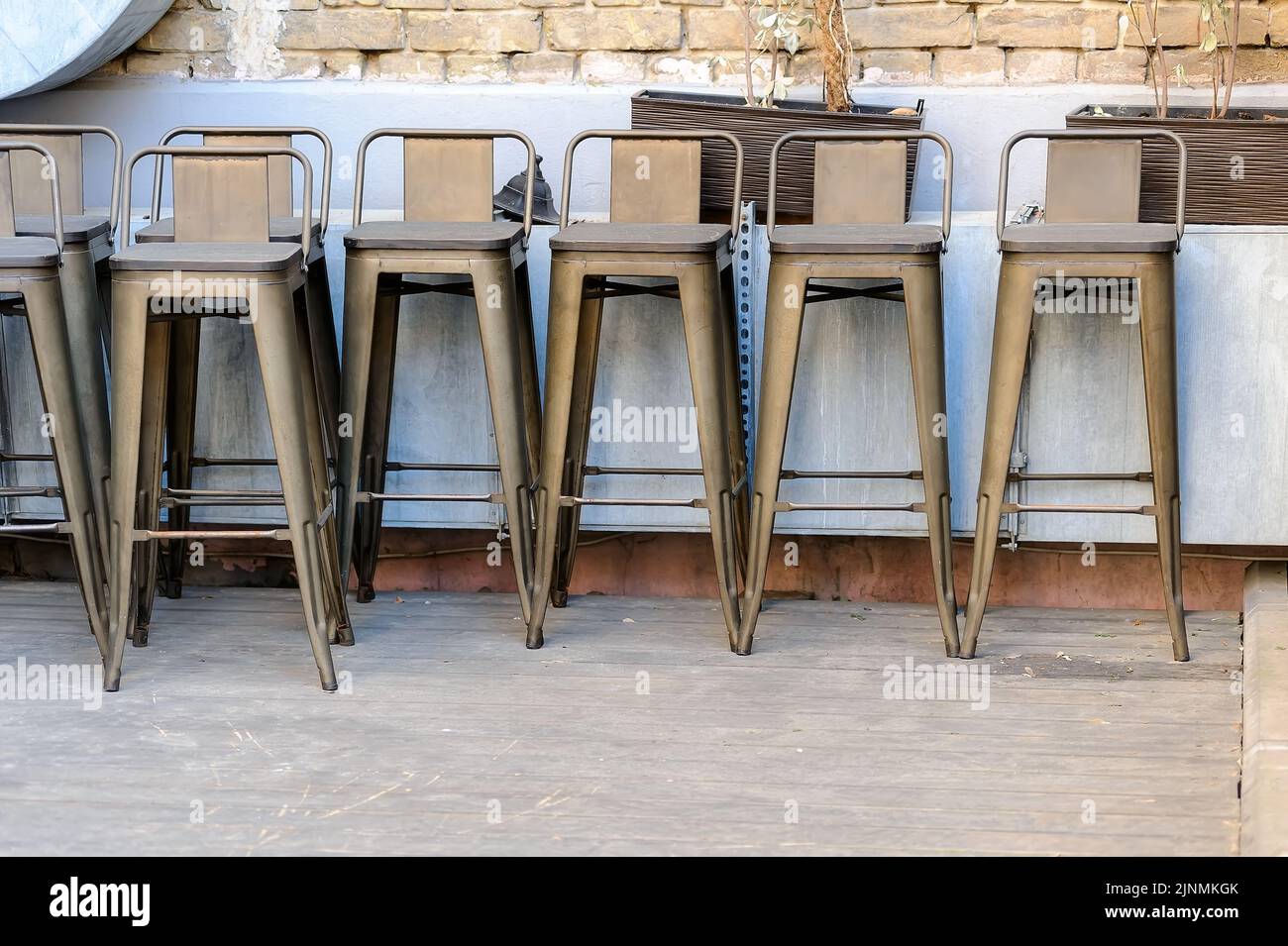 Set of wooden chair on street Stock Photo - Alamy