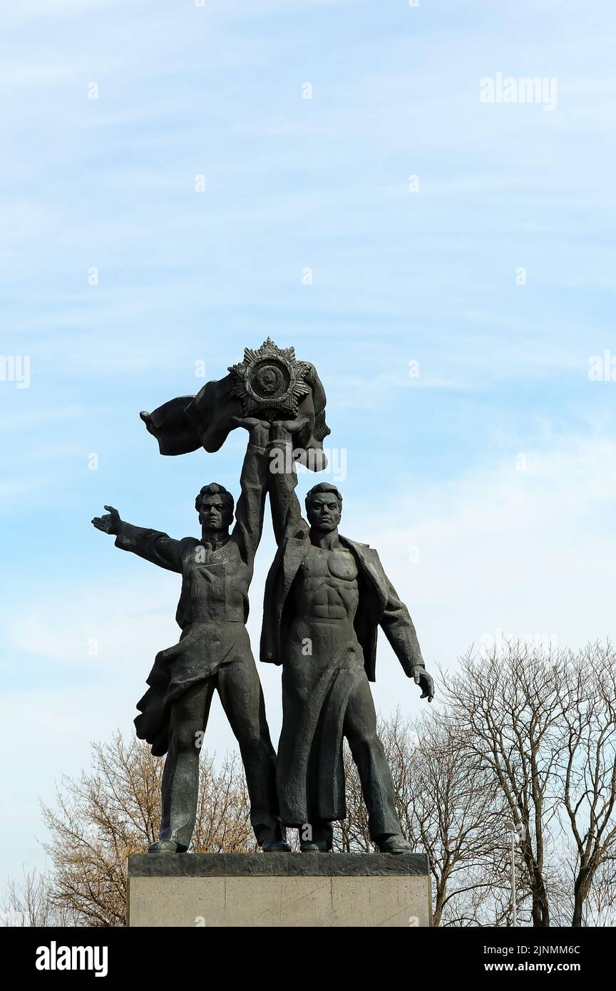 An old soviet bronze statue depicting Russian and Ukrainian nations ...