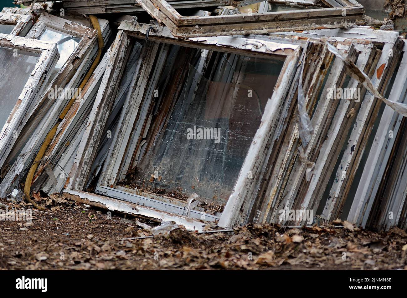 Pile of old wooden window frames outdoor Stock Photo - Alamy