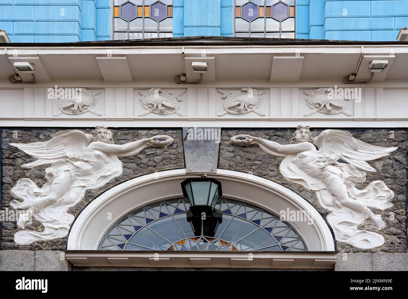 Bas relief with two angels on facade of old building in Kyiv, Ukraine ...