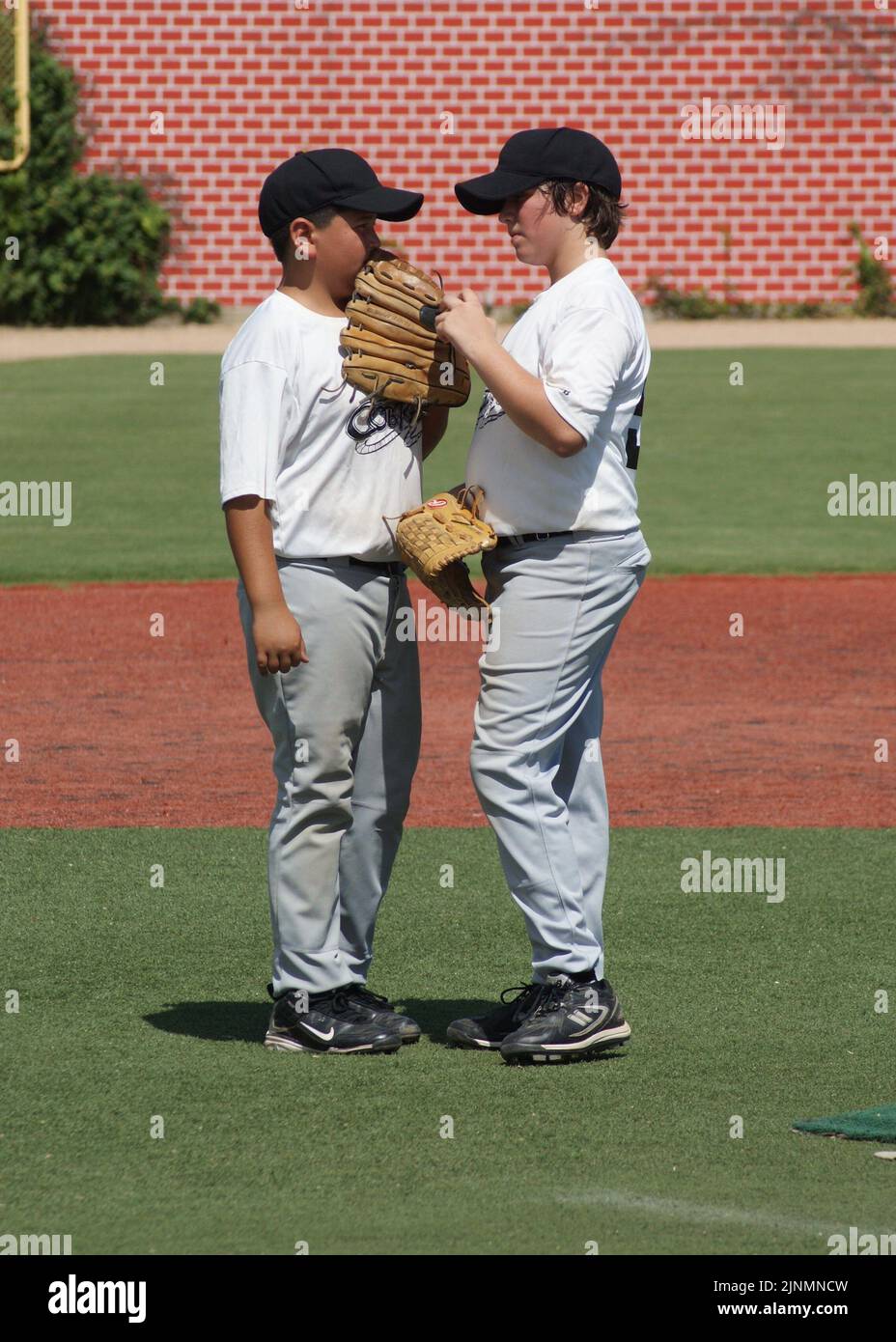 Pitcher and Third Baseman Conference Stock Photo - Alamy
