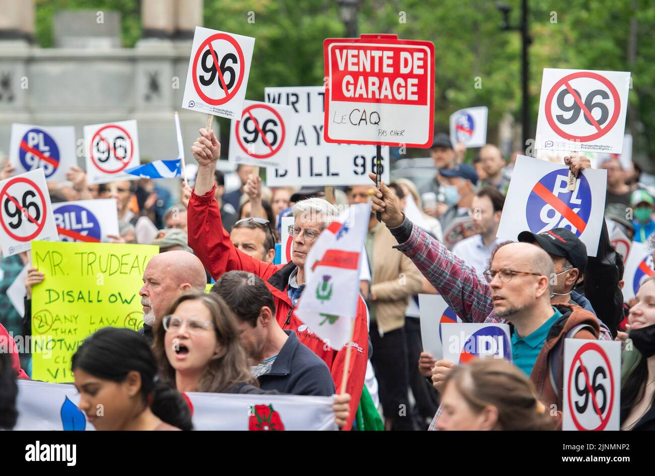 People take part in a protest against Bill 96 in Montreal on May 26 ...