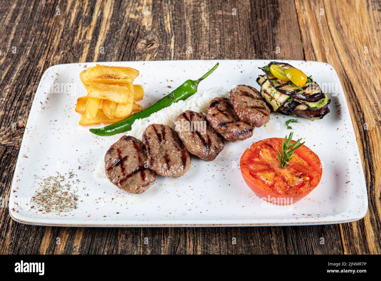 Turkish Food Meatball Kofte. Kofta with Tomatoes and Onion in Plate ...
