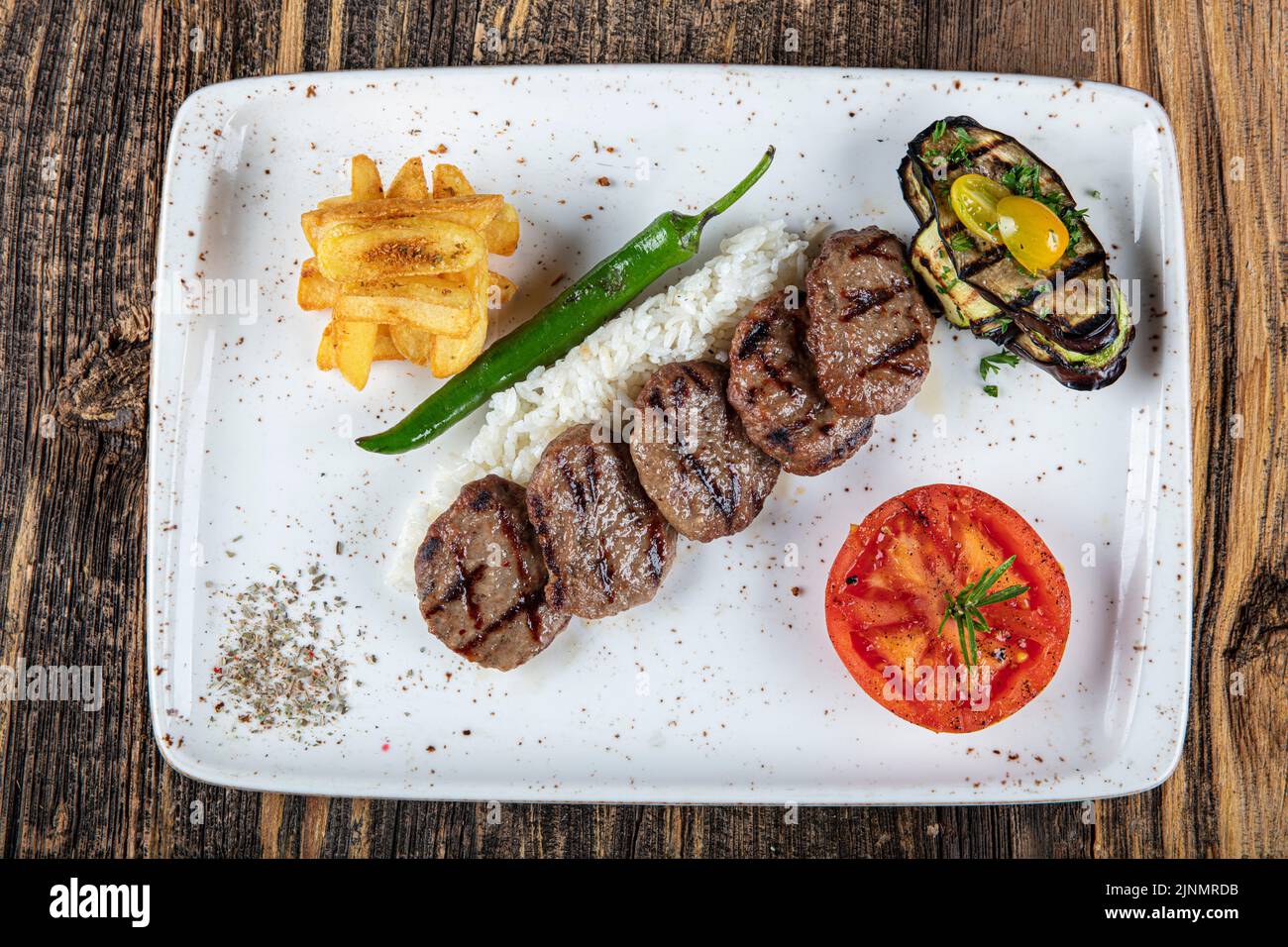 Turkish Food Meatball Kofte. Kofta with Tomatoes and Onion in Plate ...
