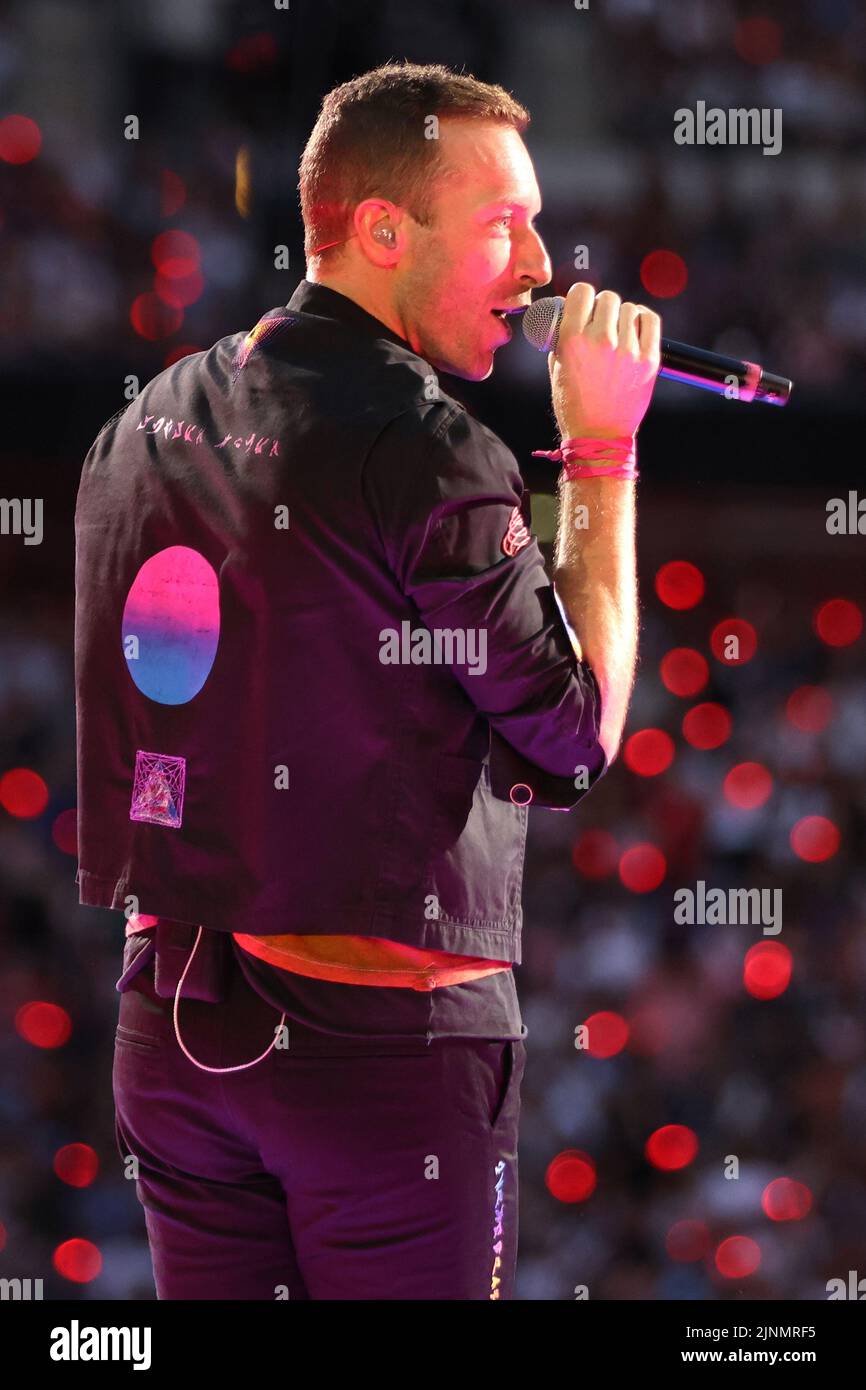 Coldplay performing on stage at Wembley Stadium, north London, during ...