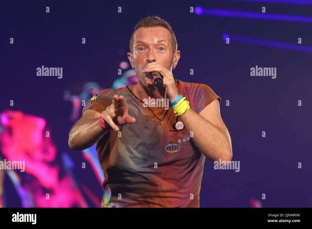 Coldplay's Chris Martin performing on stage at Wembley Stadium, north ...