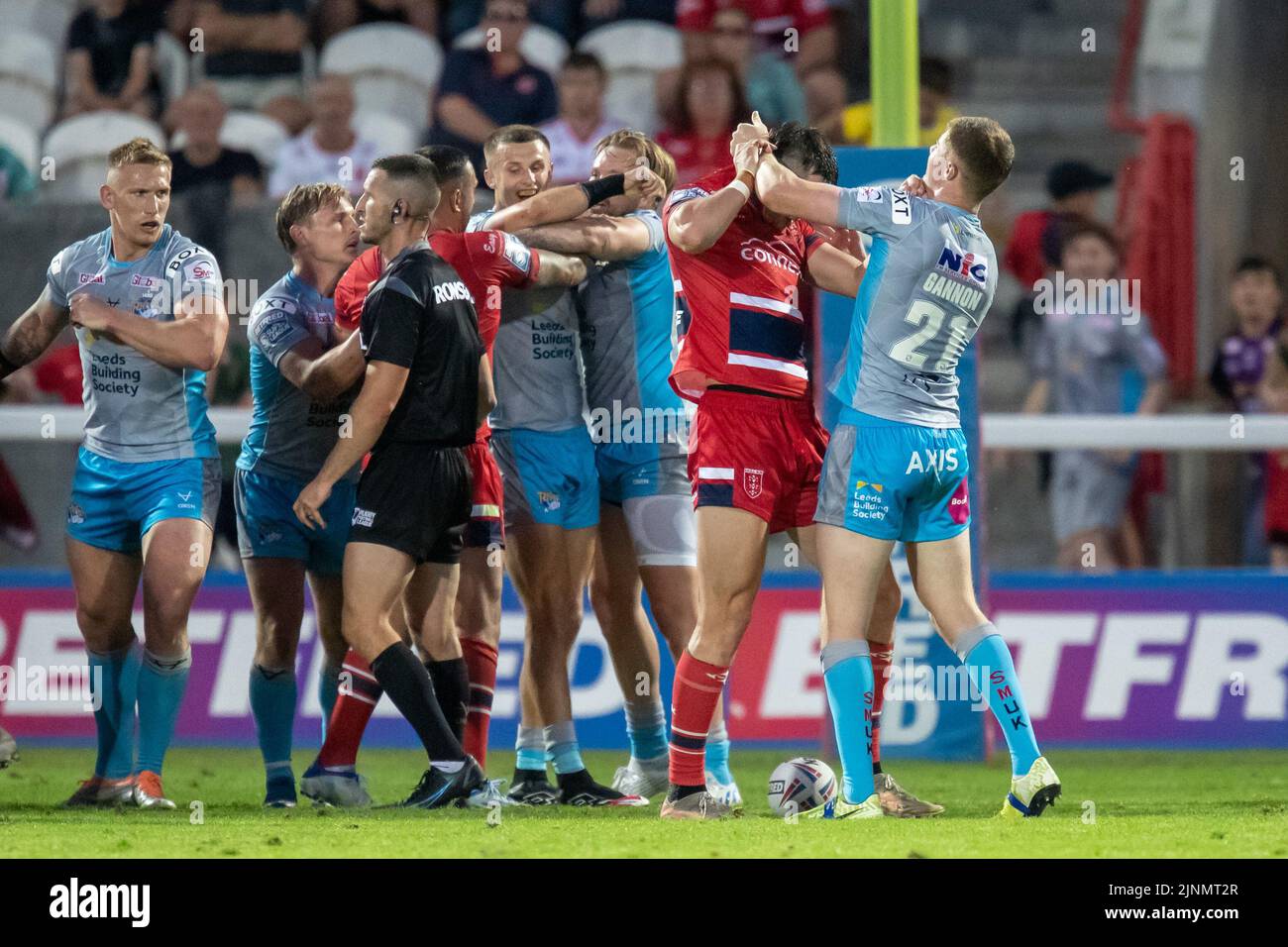 A fight breaks out between the two teams at the end of the first half ...