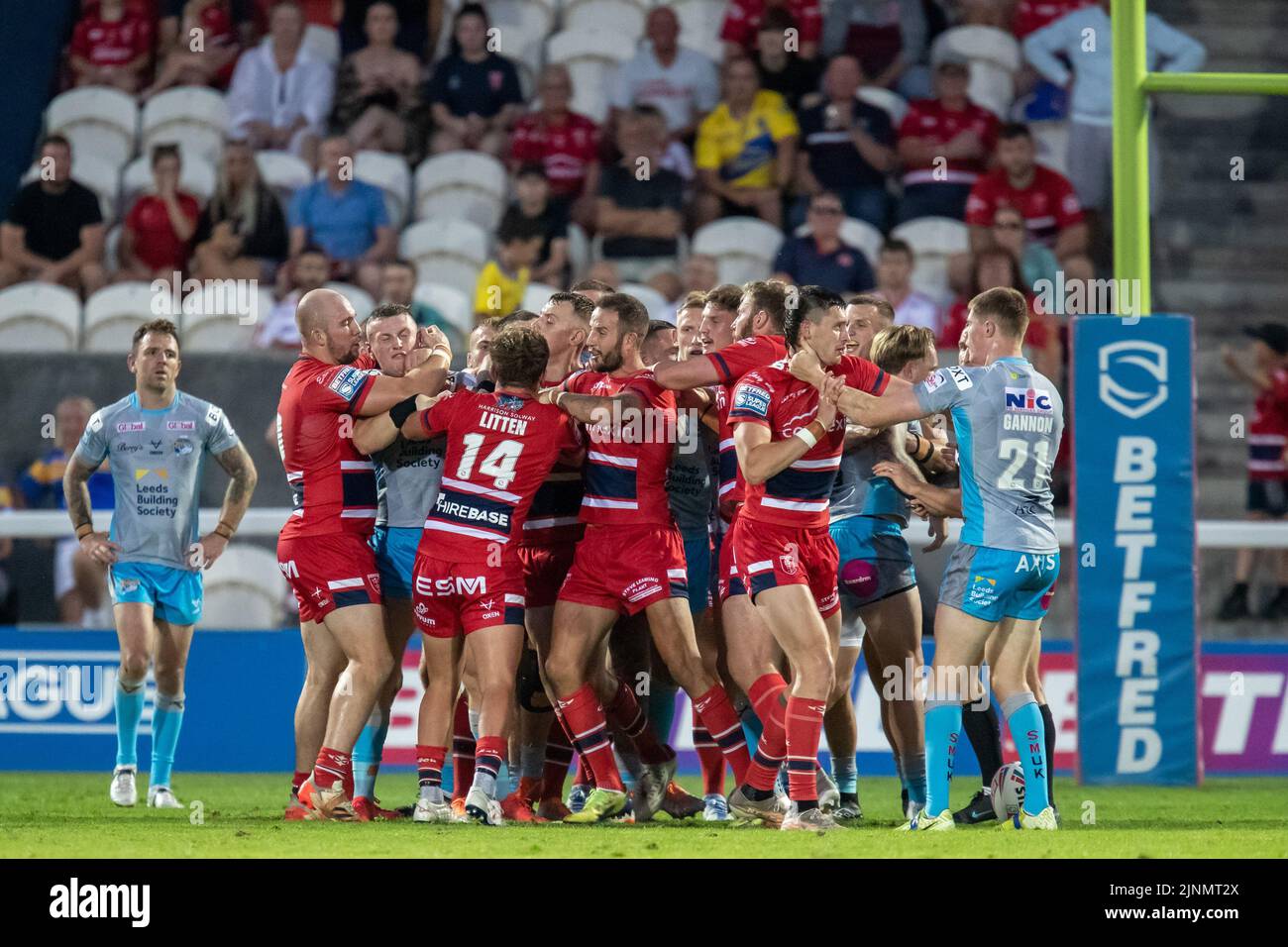 A fight breaks out between the two teams at the end of the first half ...