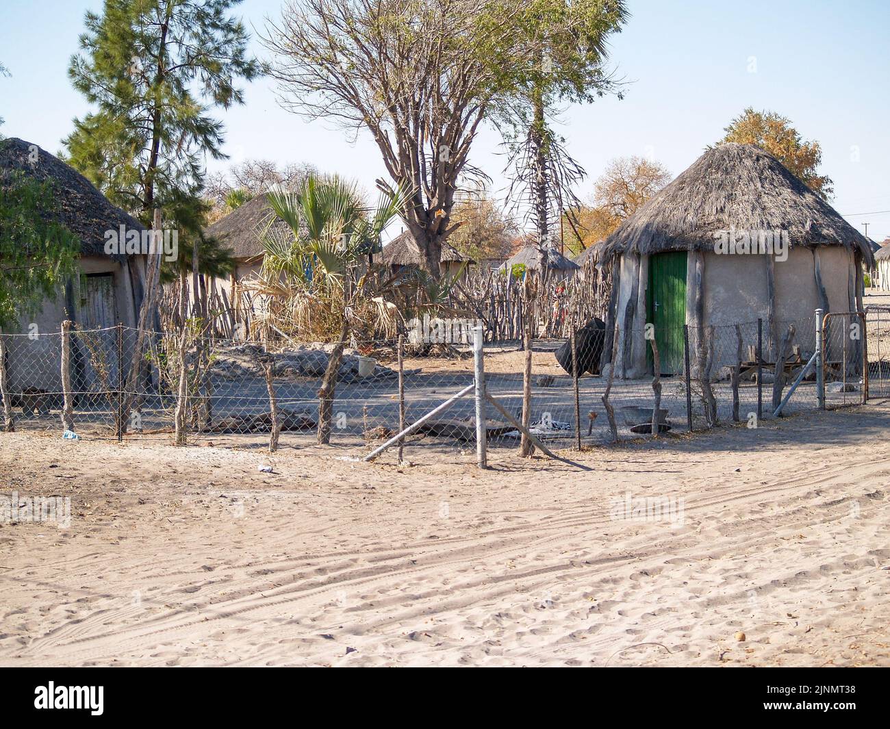 African village compound in sandy environment in Botswana Stock Photo ...
