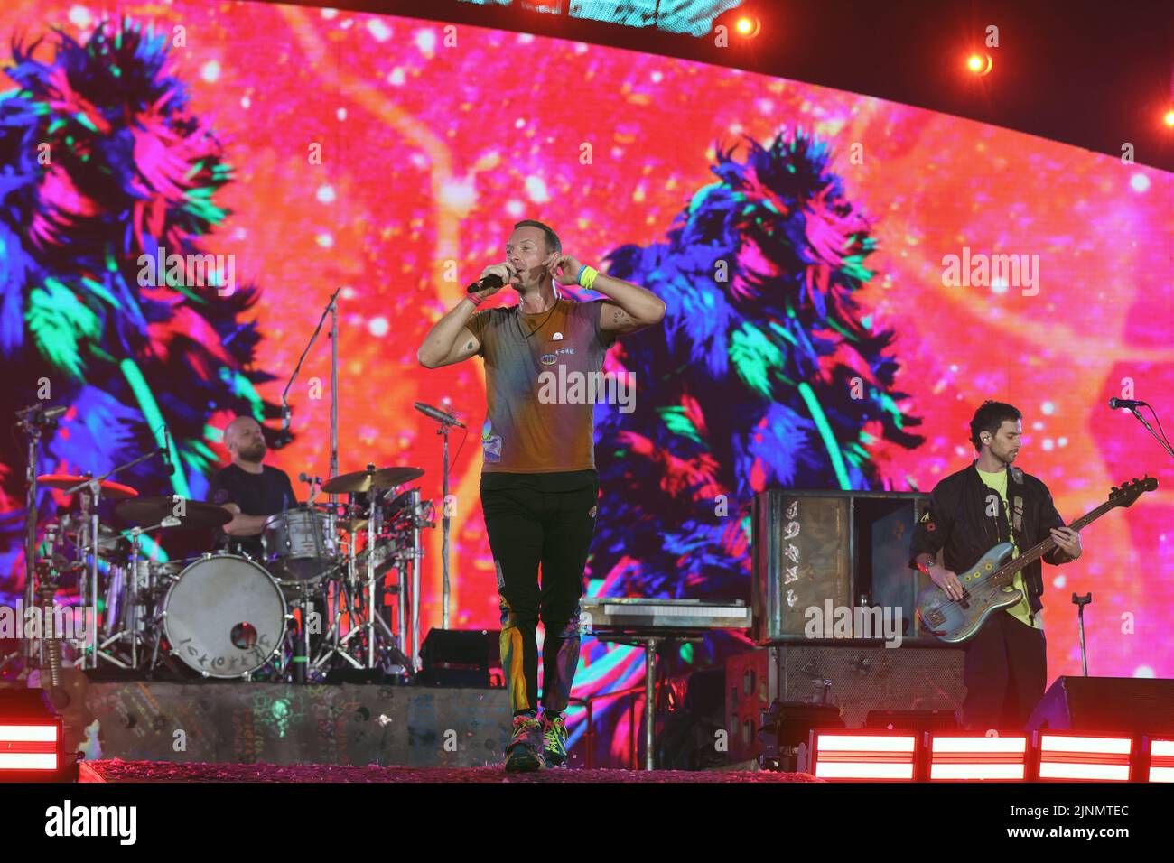 Coldplay performing on stage at Wembley Stadium, north London, during ...